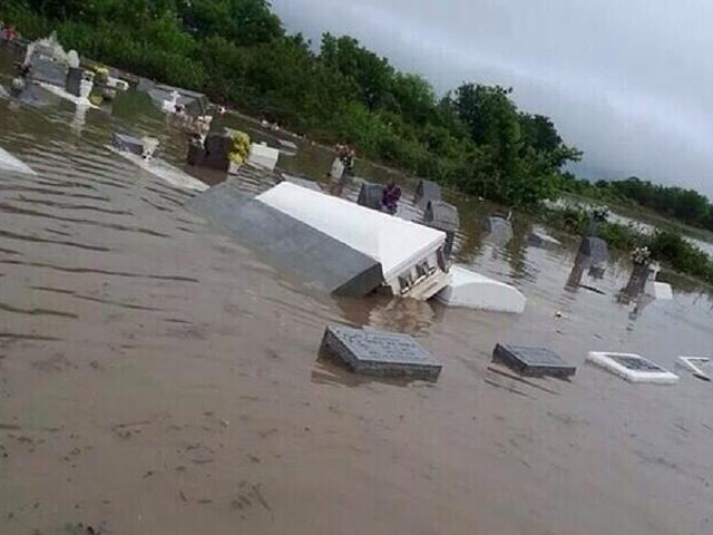 Caskets float away due to massive flooding in Louisiana | wtsp.com