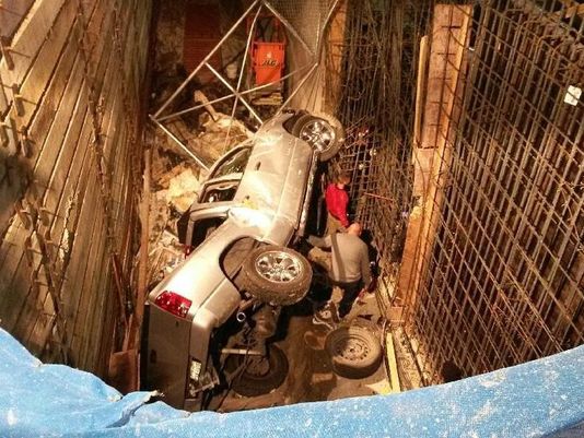 Driver survives 25-foot fall into construction pit | wtsp.com