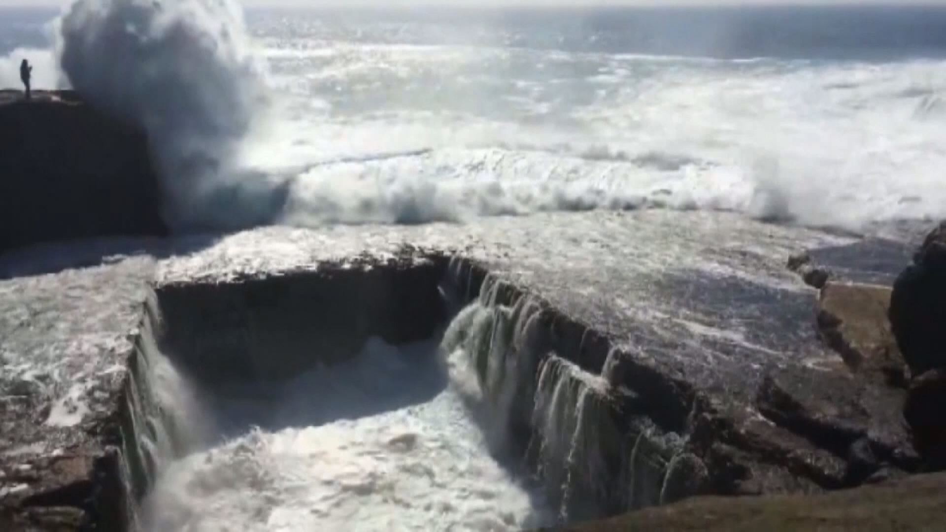 WATCH: Wave sweeps woman into the sea | wtsp.com