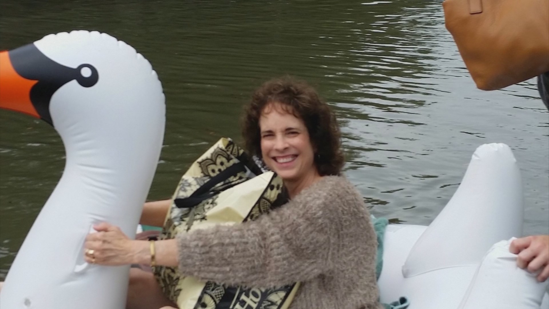 Midwife rides inflatable swan during storm to birth | wtsp.com