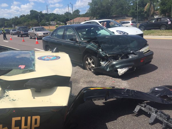 FHP trooper injured after car crashes into cruiser | wtsp.com